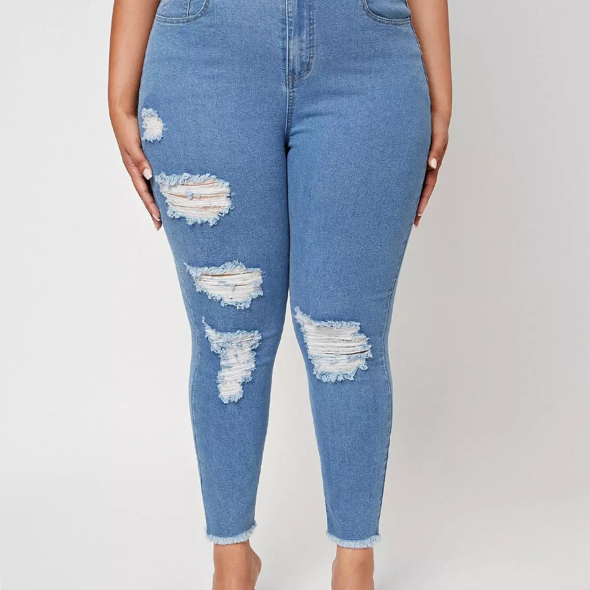 Plus High Waist Ripped Raw Trim Skinny Jeans - Oman